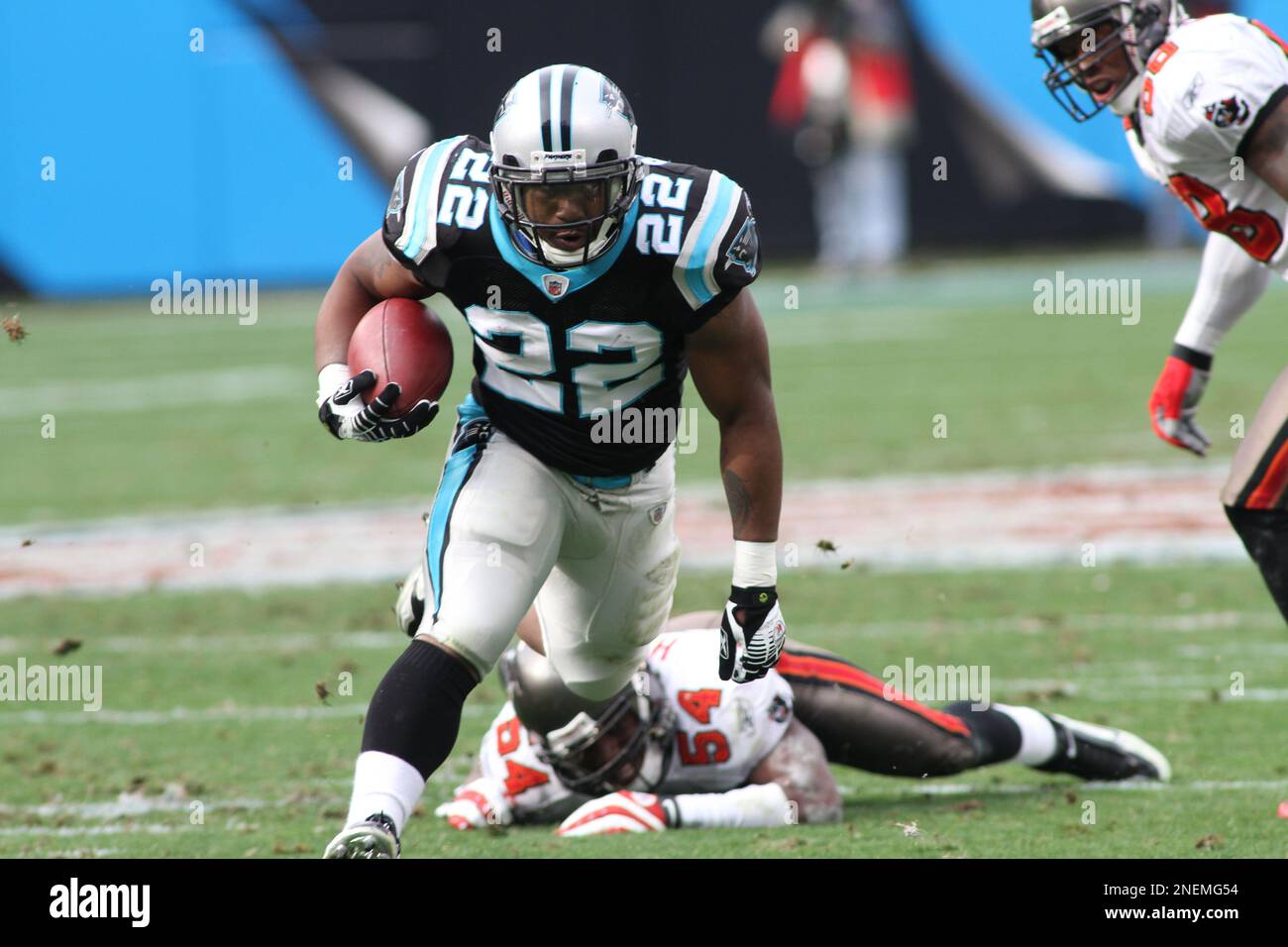 Carolina Panthers' Tyrell Sutton (22) runs past Tampa Bay Buccaneers ...