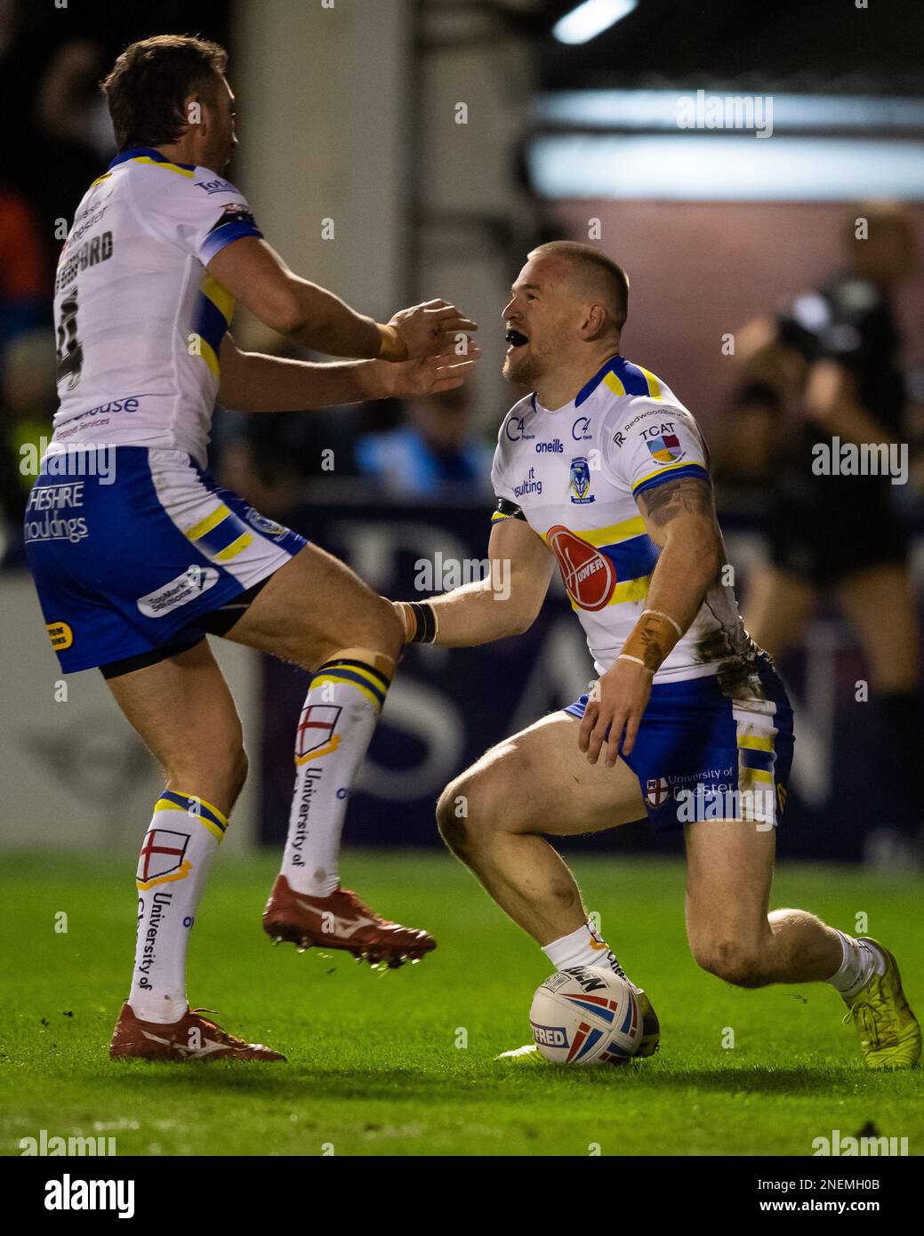 Matt Dufty #1 of Warrington Wolves celebrates his try during the ...