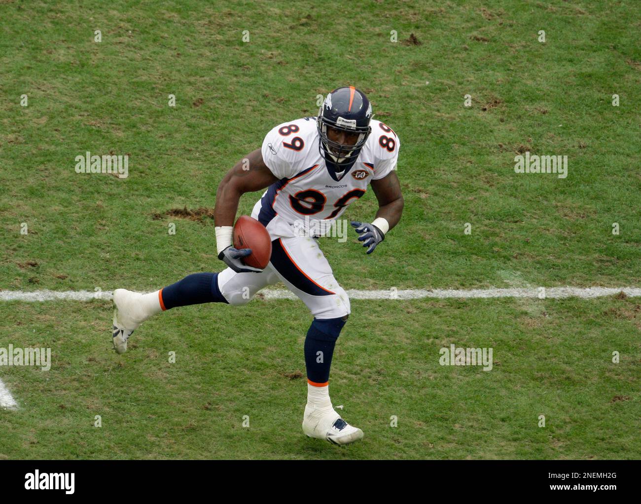 Denver Broncos tight end Daniel Graham runs the ball during the first ...