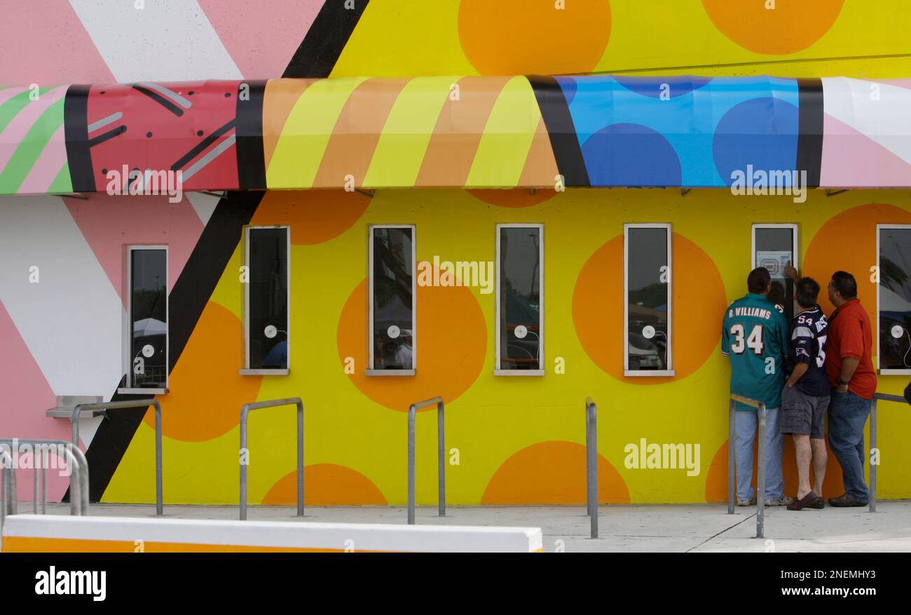 Fans look for tickets at Land Shark Stadium in Miami, Sunday, Dec. 6 ...