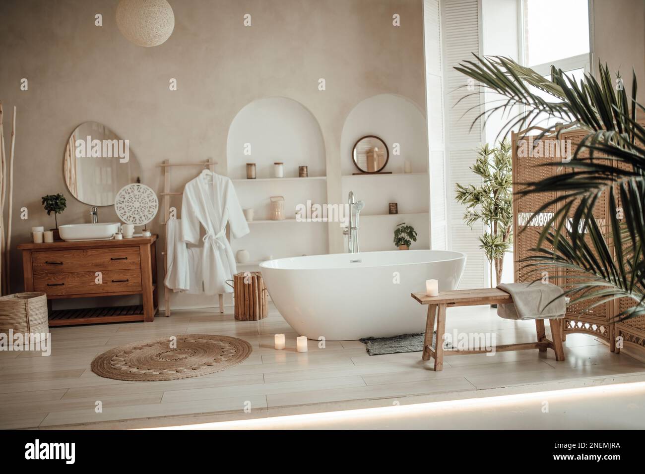 Soft native hues organic shapes look of bathroom with big window oval ...