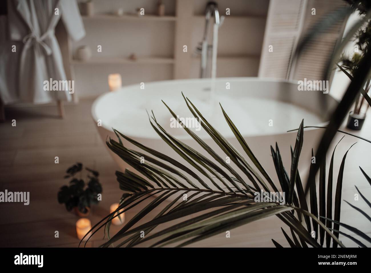 Soft native hues organic shapes look of bathroom with big window oval ...