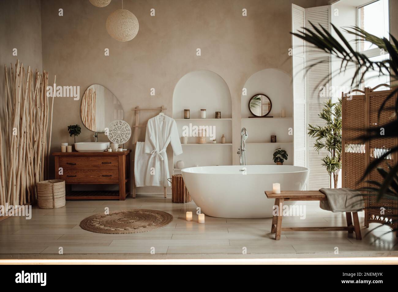 Soft native hues organic shapes look of bathroom with big window oval ...