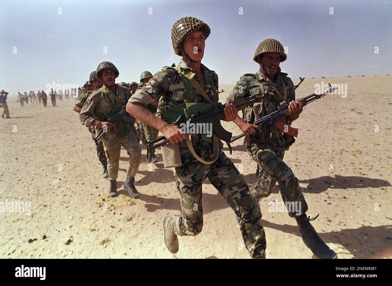 Syrian commandos shout and strut during training on Tuesday, Sept. 19 ...