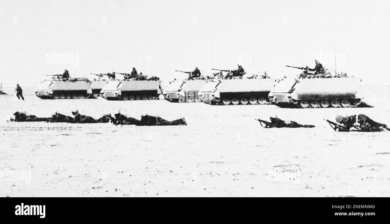 Saudi Arabian armored personnel carriers support ground troops as they ...