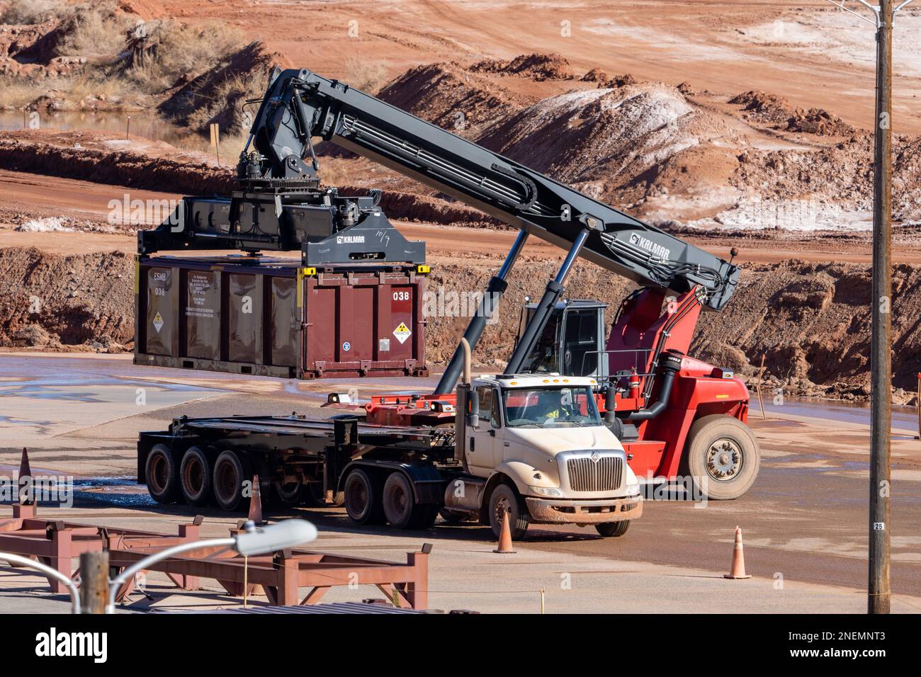 A reachstacker container handler removes a filled and washed container ...