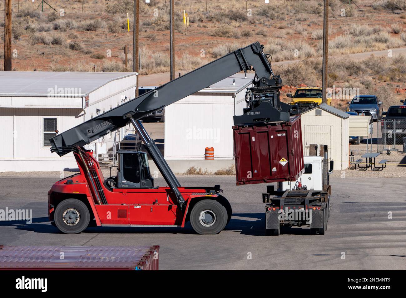 A Reachstacker Container Handler Loads A Filled And Washed Container