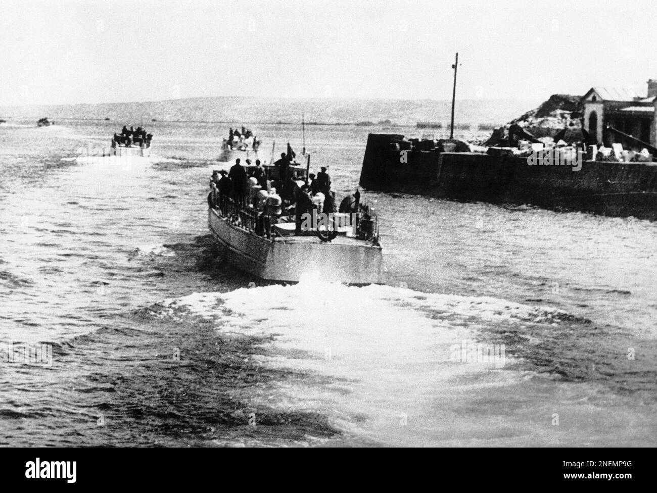 A patrol of Nazi torpedo-carrying Mosquito Boats leave their home base ...