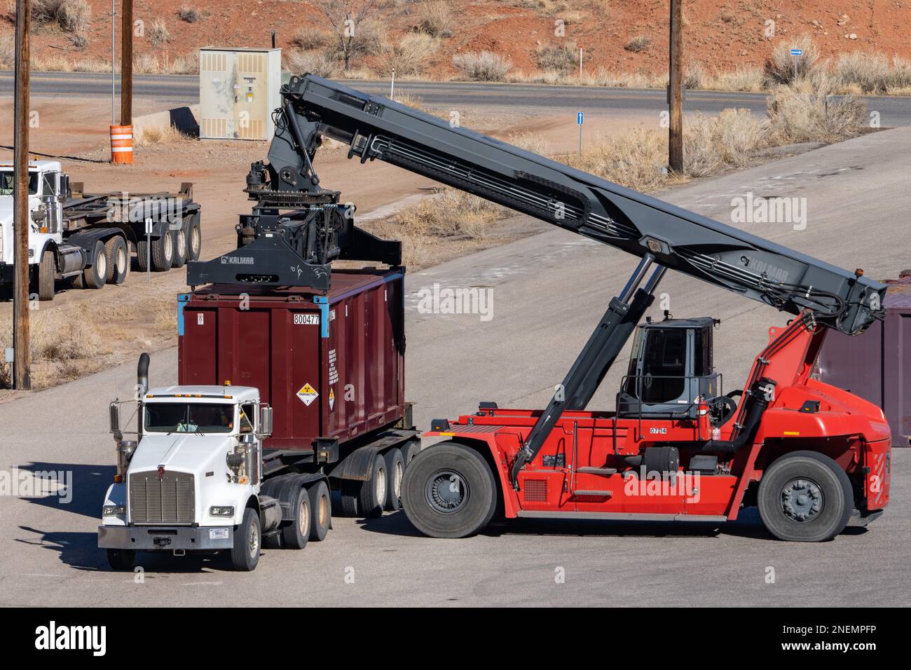 A Reachstacker Container Handler Removes A Returning Empty Container