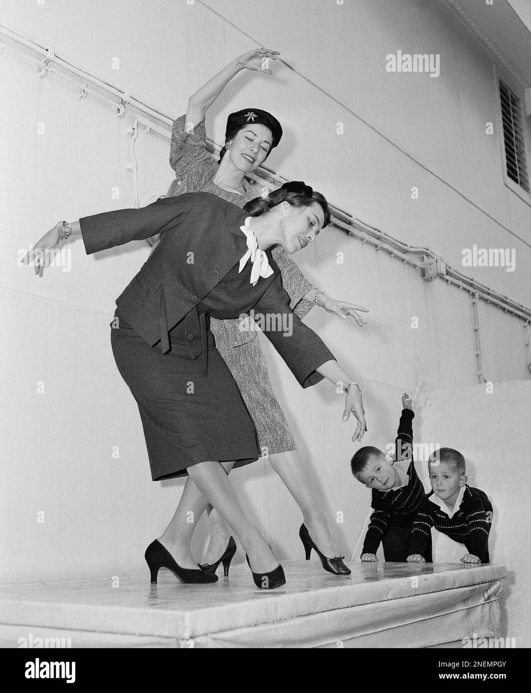 Marjorie Tallchief, (light suit, black hat) back, and her sister Maria ...