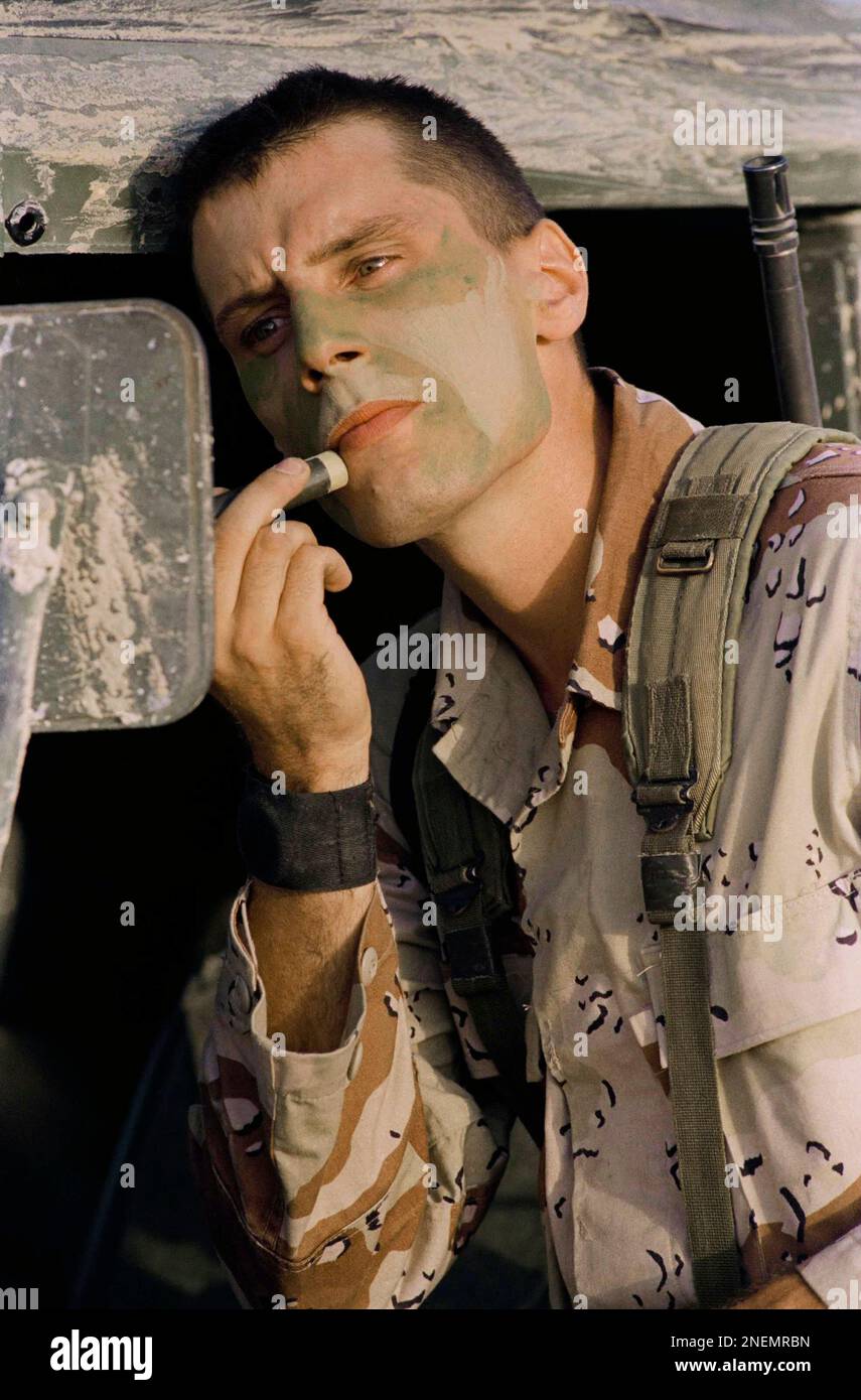 Sgt. Jeff Theim of Mukwonago, Wis., from the 82nd Airborne applies ...