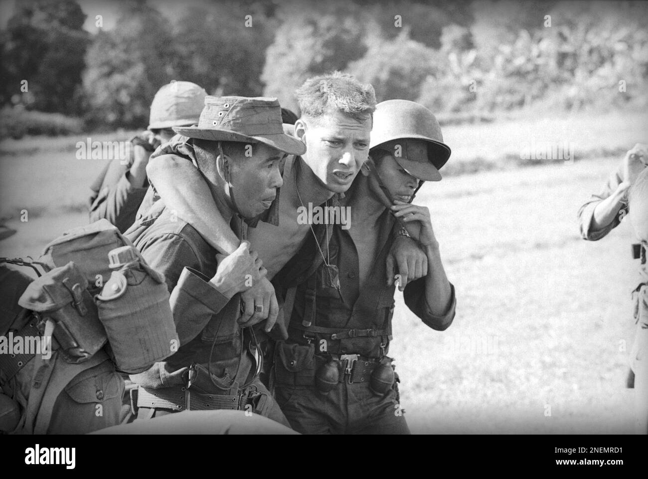 A U. S. Platoon leader wounded on a patrol by Viet Cong grenade ...