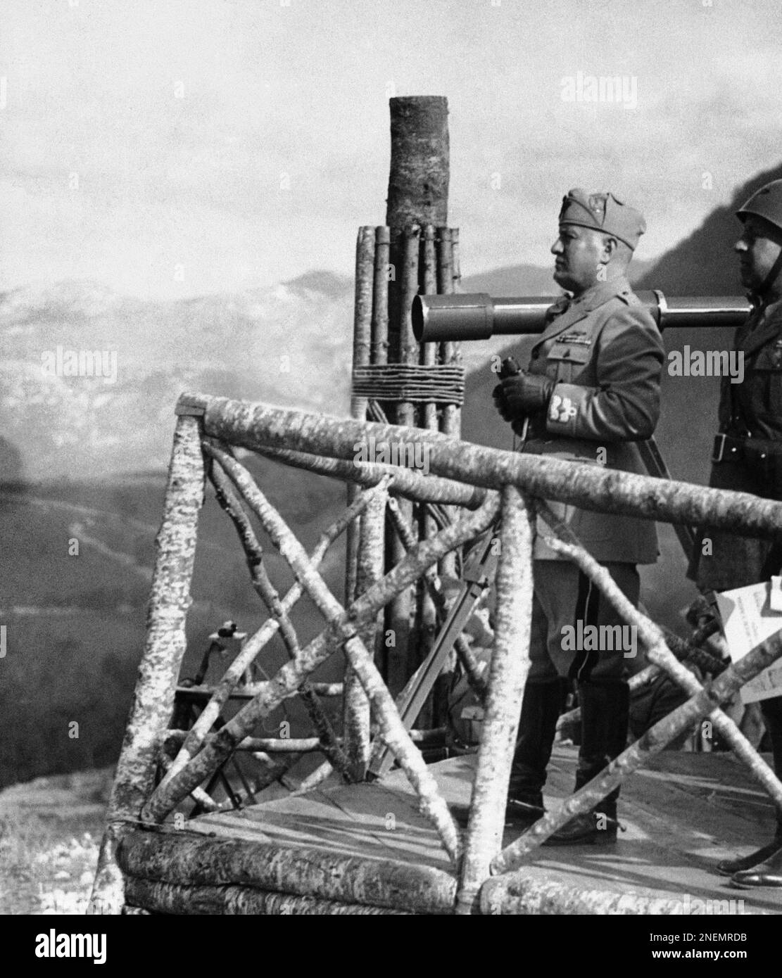 Italian Prime Minister Benito Mussolini, Il Duce, stands on a raised ...