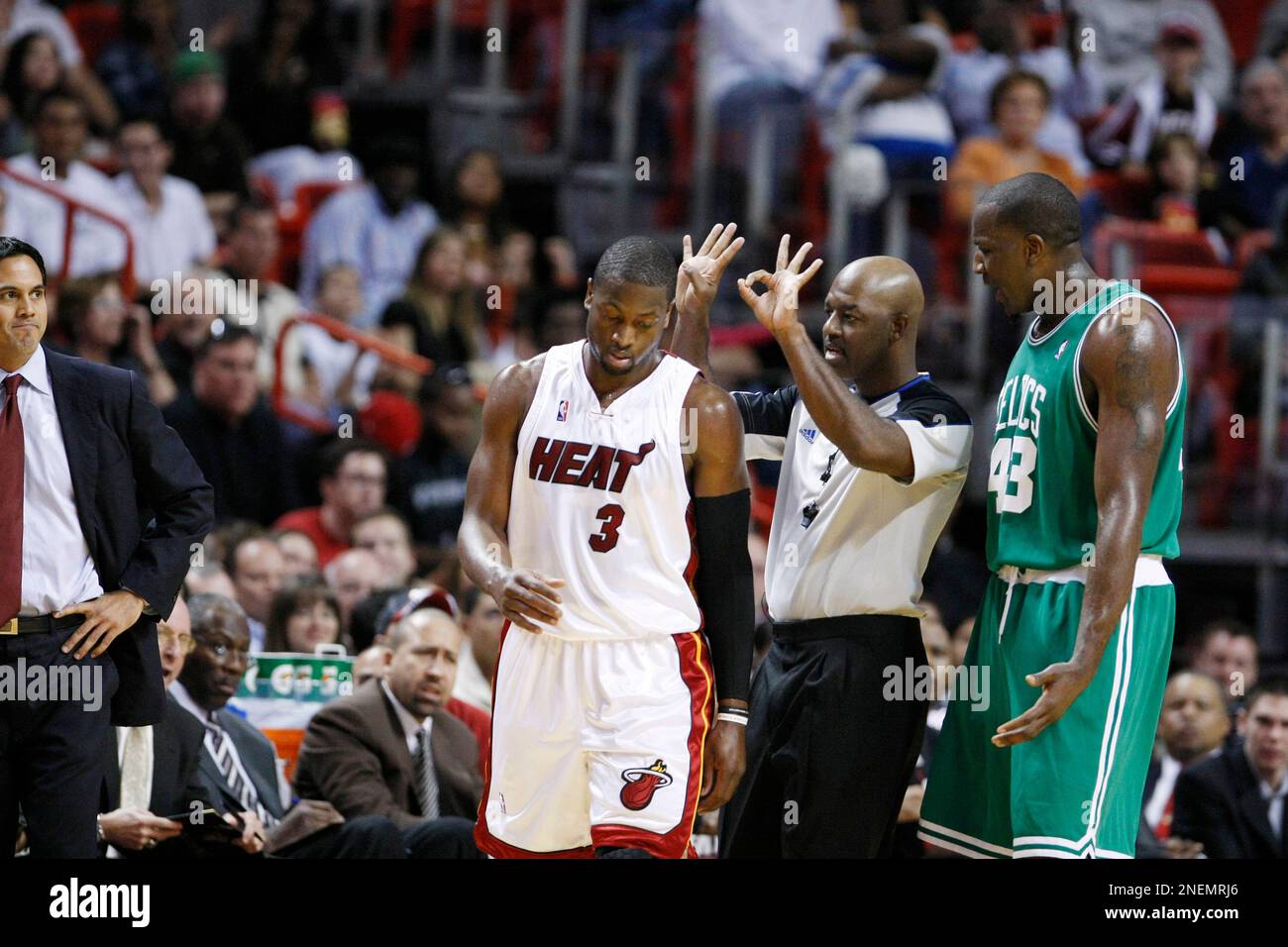 Miami Heat's Dwyane Wade (3) and Boston Celtics' Kendrick Perkins argue ...