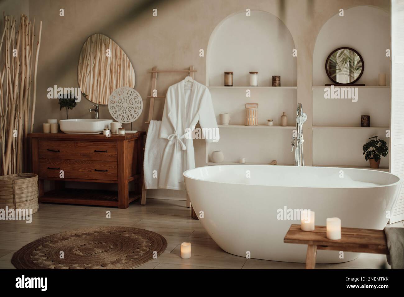 Soft native hues organic shapes look of bathroom with big window oval ...