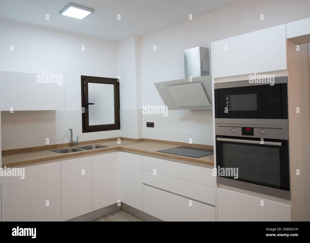 perfectly equipped modern kitchen in a home Stock Photo - Alamy