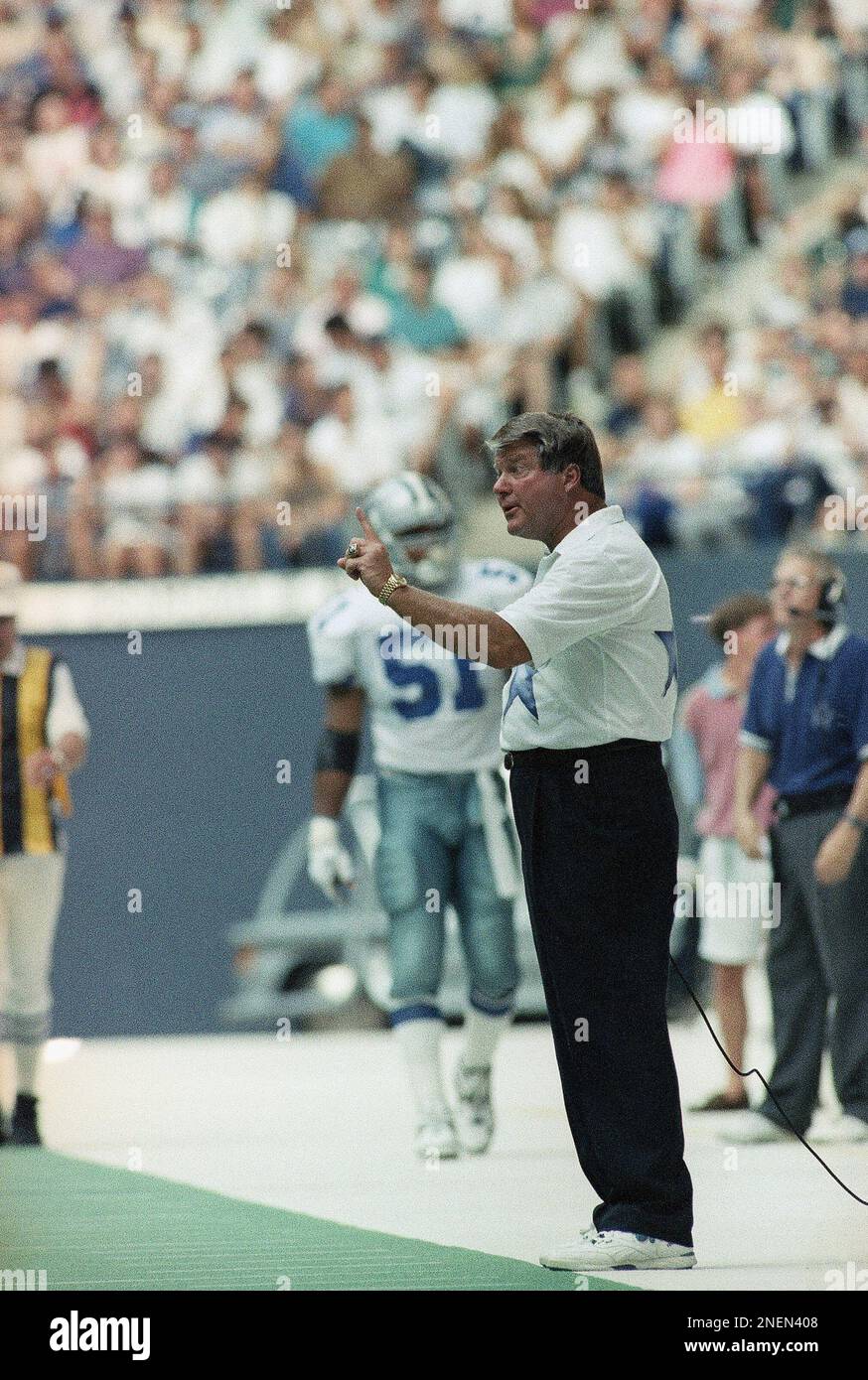 Jimmy Johnson, Dallas Cowboys football coach shown on sidelines during ...