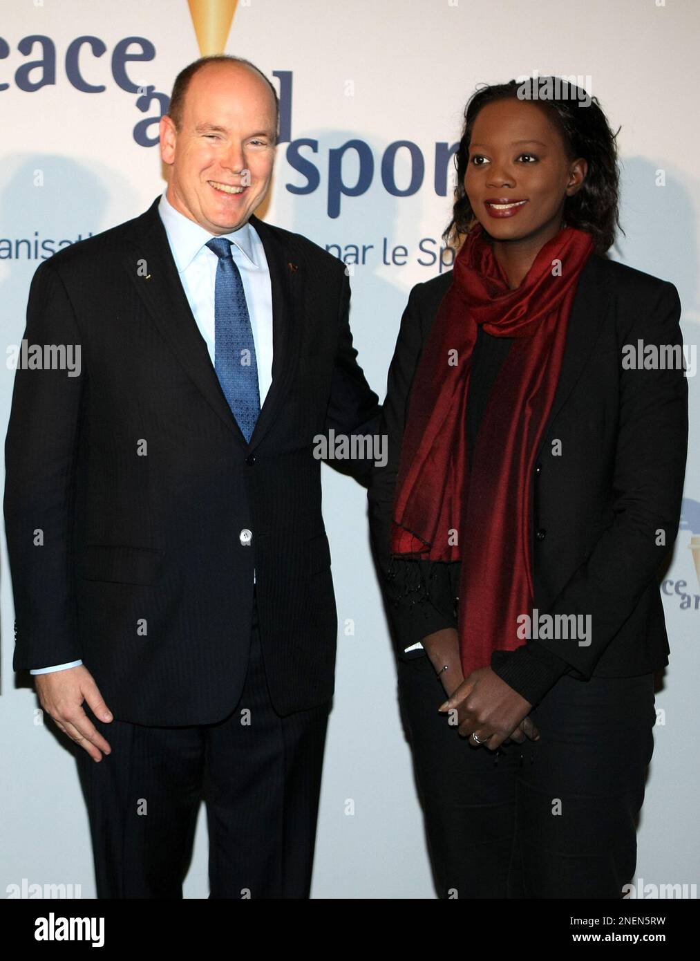 French secretary of State for Sports Rama Yade, right, poses with ...