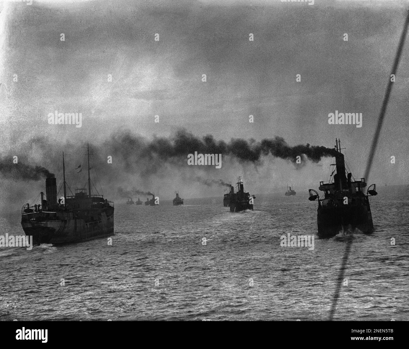 Ships of a British convoy, stretching as far as the eye can see, moving ...