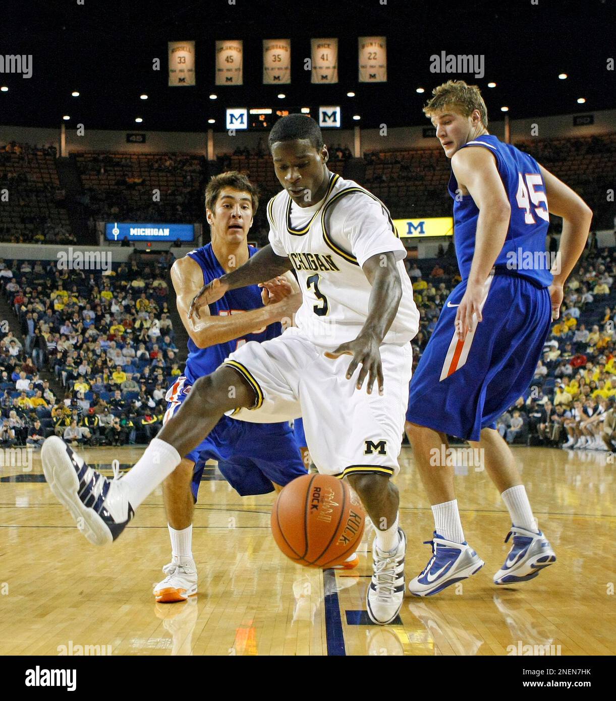 Houston Baptist forward Remy Boswell, left, and center Mario Flaherty ...