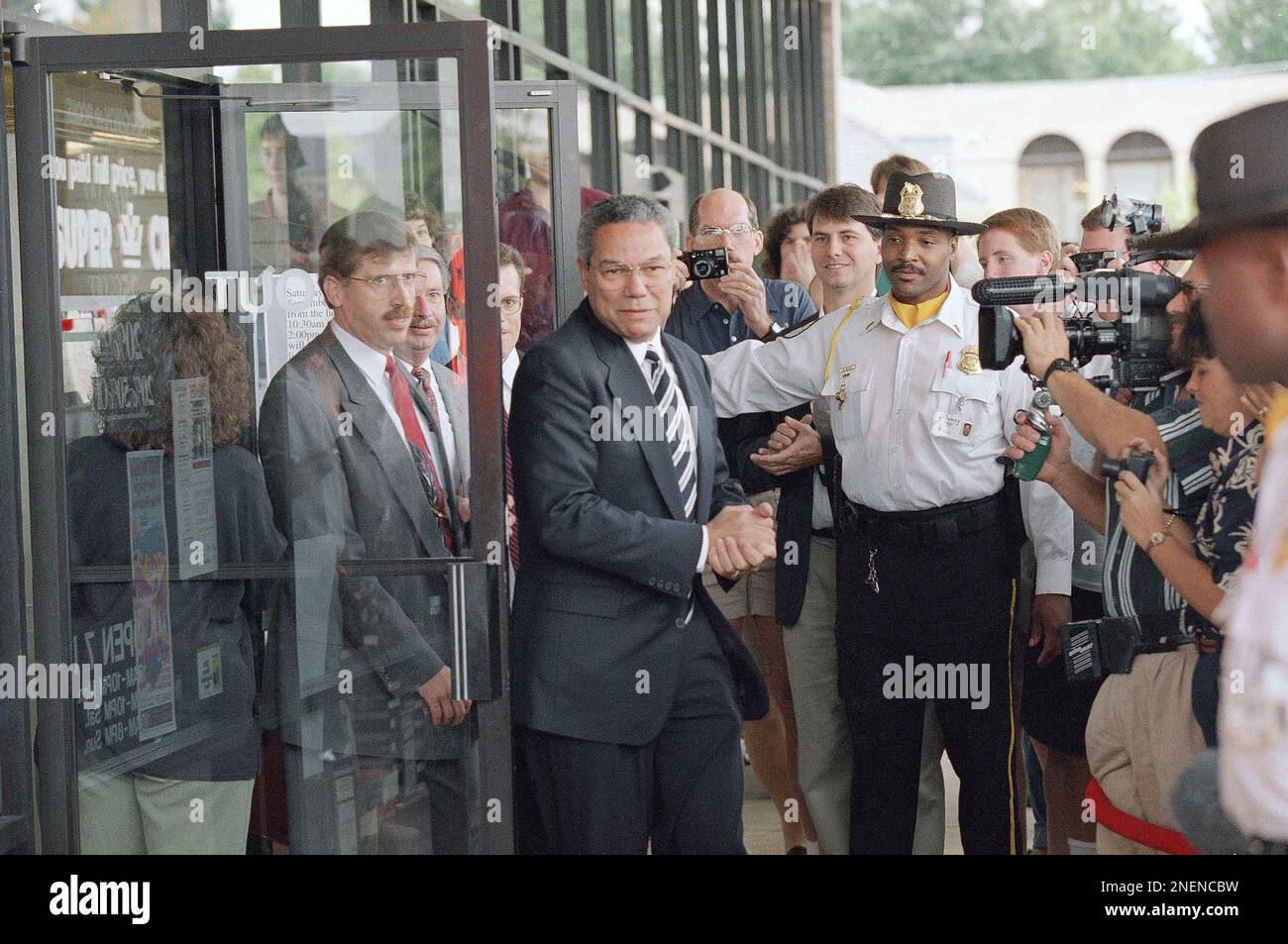 Retired Gen. Colin Powell pauses as he arrives at a book store in ...