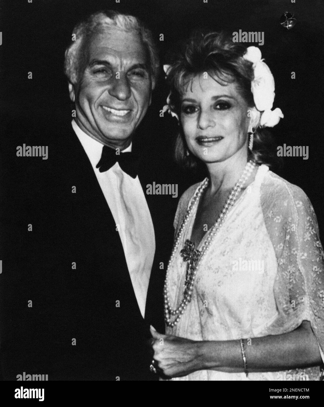 Barbara Walter and Merv Adelson pose for photographers moments after ...