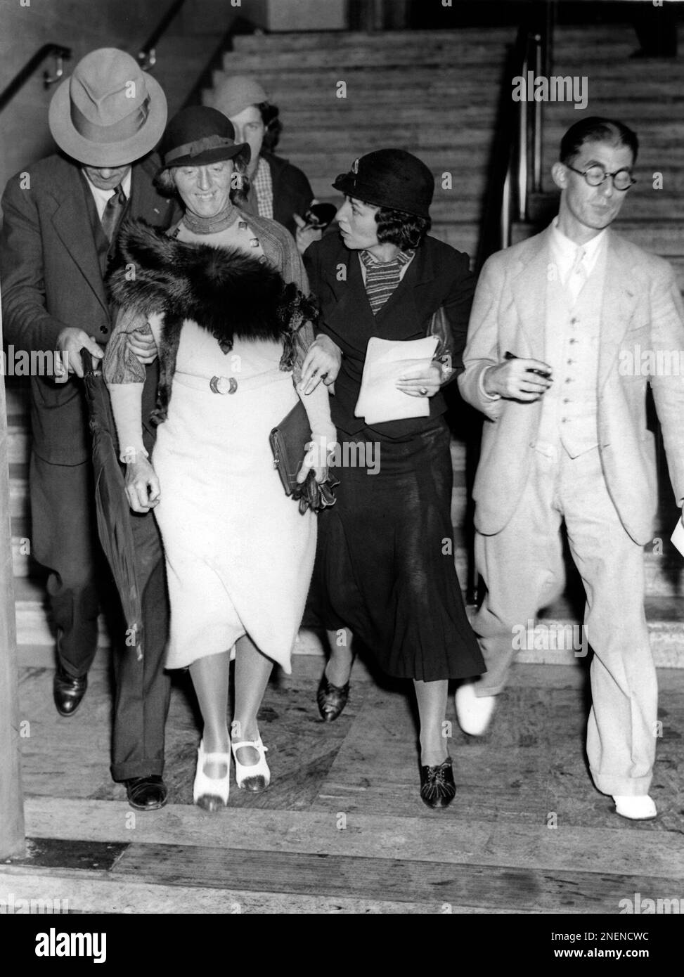 Mrs. Anna Hauptmann (second from left) as she left the Bronx county ...