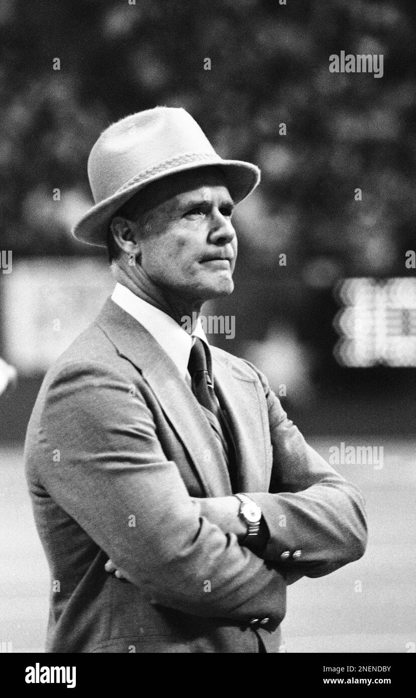Tom Landry, the only coach the Cowboys ever had. watches from the side ...