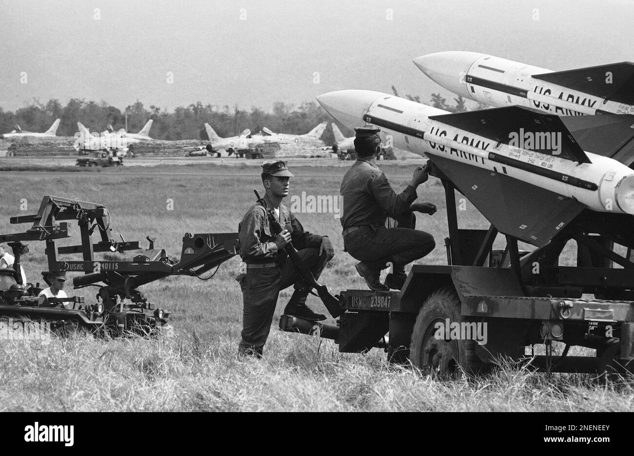 Two soldiers are shown with U.S. Hawk anti-aircraft missiles ready for ...