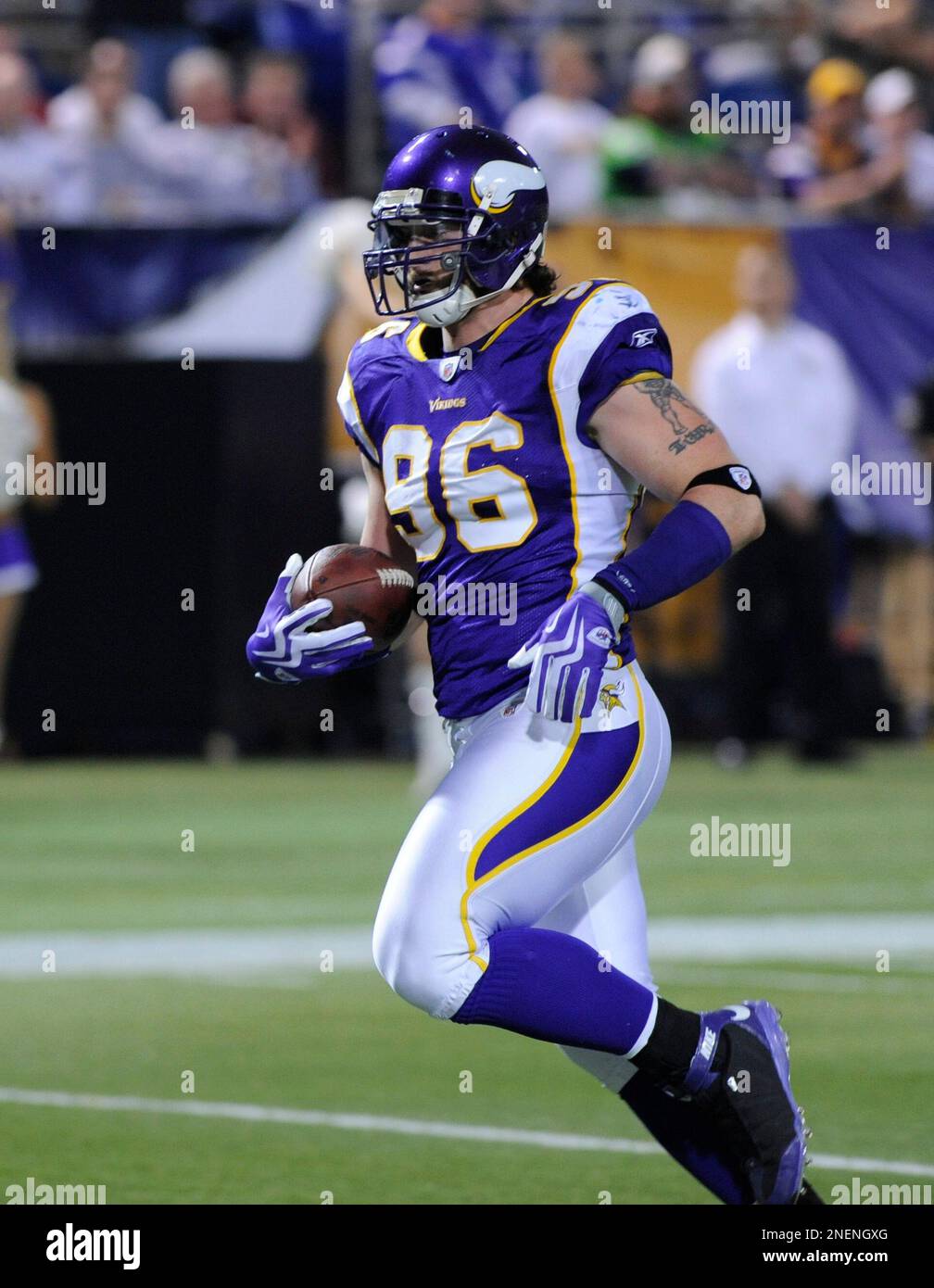 Minnesota Vikings defensive end Brian Robison picks up a loose ball in ... Minnesota Vikings defensive end Brian Robison picks up a loose ball in ...