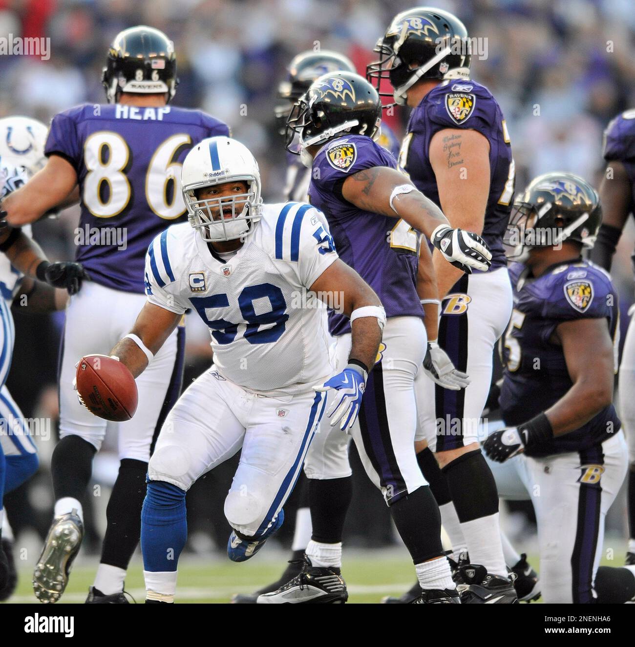 Indianapolis Colts linebacker Gary Brackett turns toward the bench ...