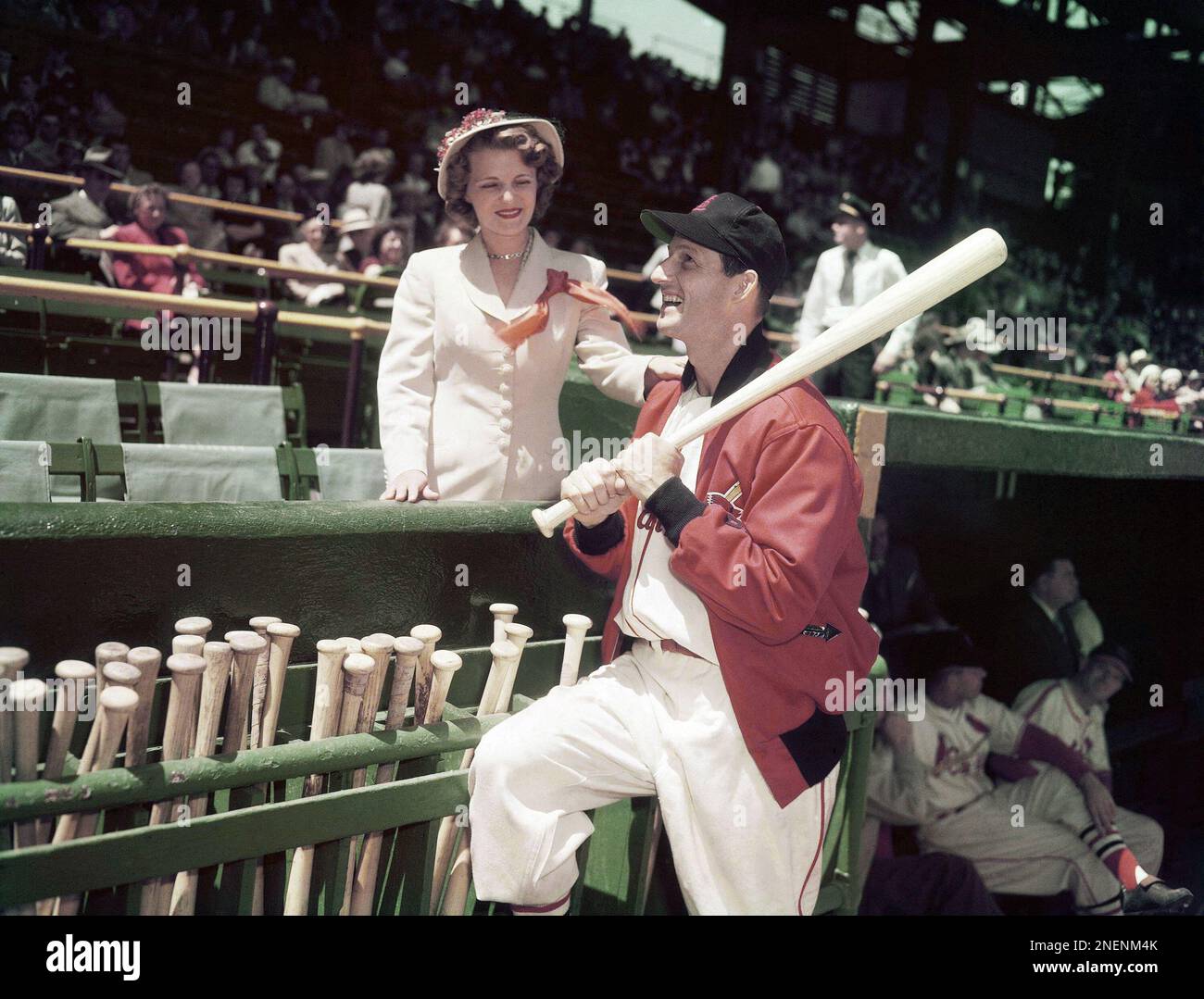 Outfielder Stan Musial of the St. Louis Cardinals, with bat in hand ...