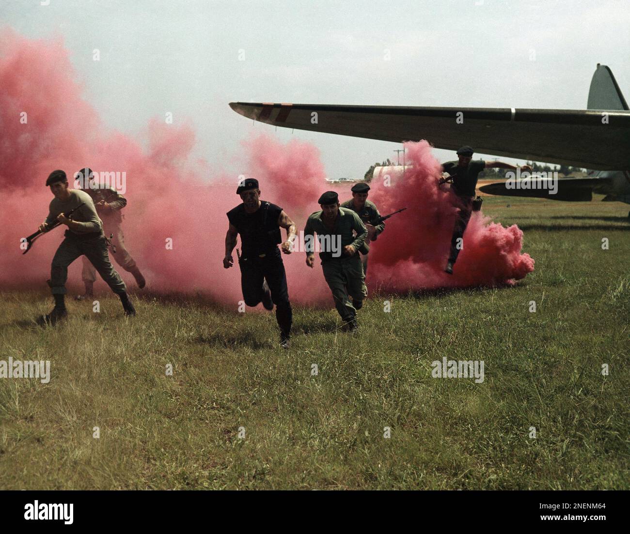 A Special Forces team quickly moves out after placing a simulated ...