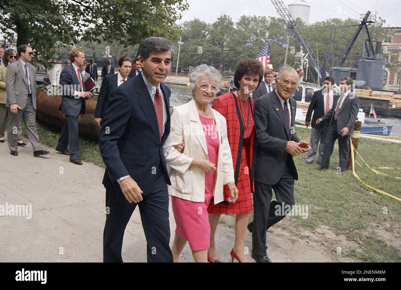 Michael Dukakis, left, holds the arm of his immigrant mother, Euterpe ...