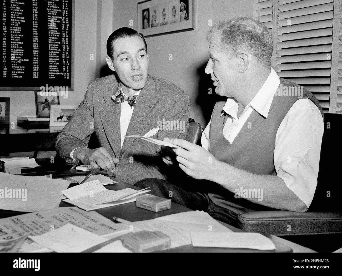 Cleveland Indians pitcher Bob Feller (left), and club President Bill ...