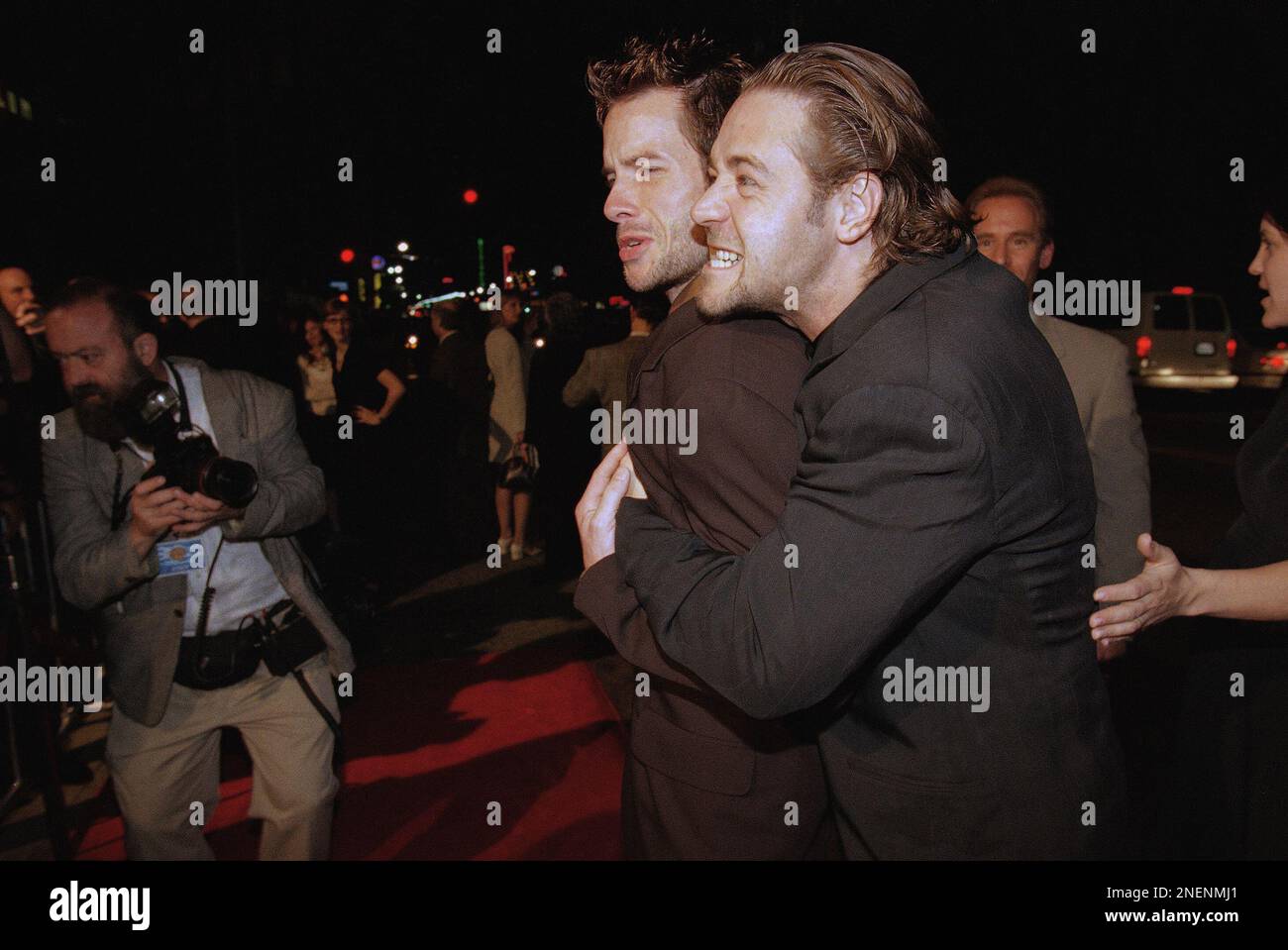 Actor Russell Crowe, right, sneaks up on his ?L.A. Confidential? co ...