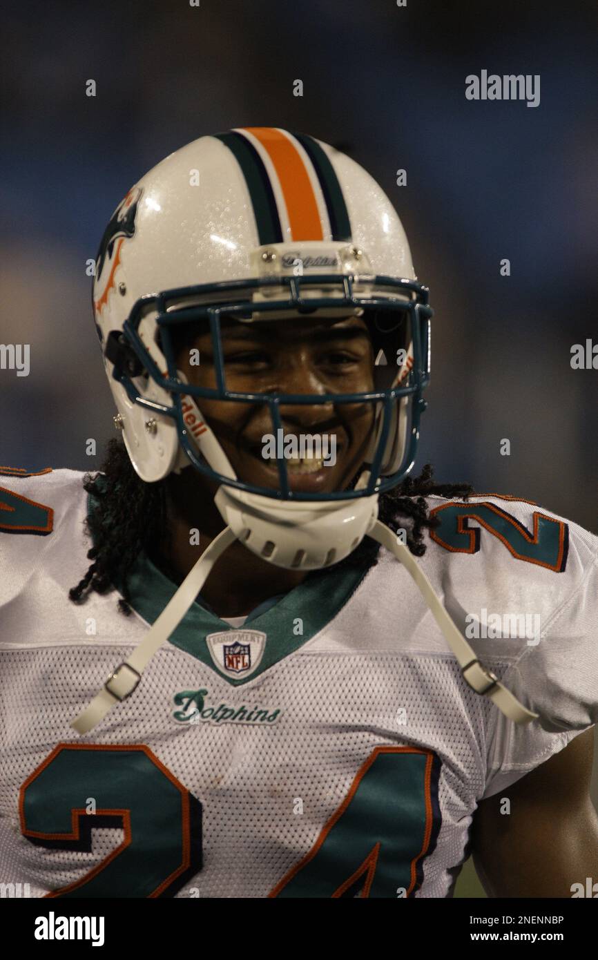 Miami Dolphins cornerback Sean Smith laughs on the sidelines as the ...