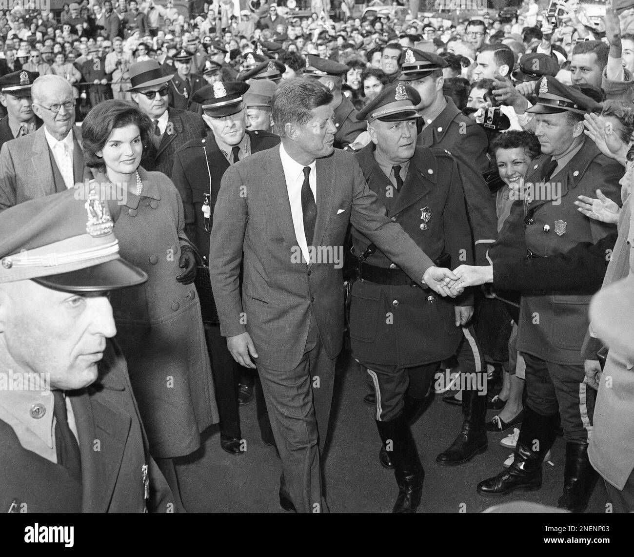 President-elect John F. Kennedy gets a congratulatory handshake as he ...