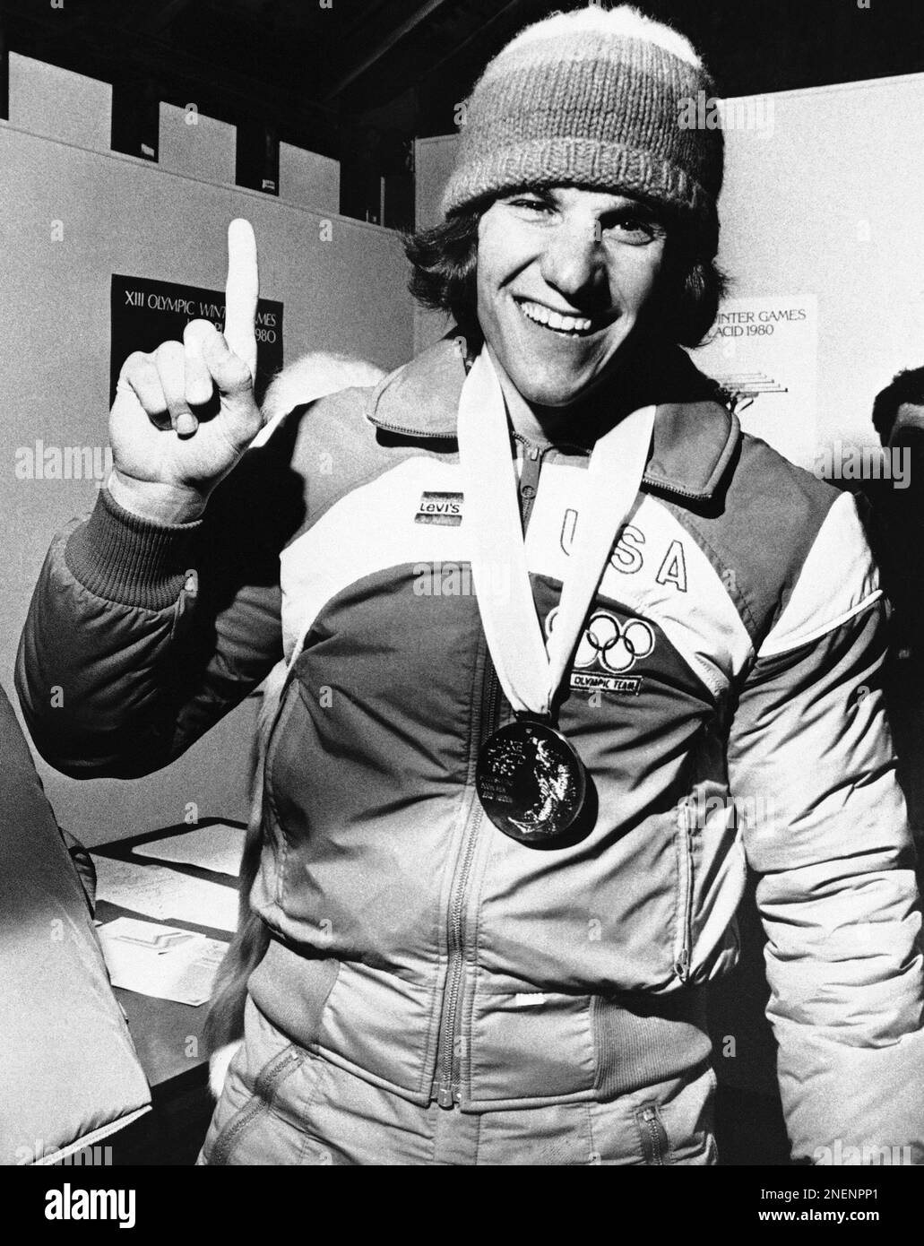 Eric Heiden, of Madison, Wis., raises his finger to show that he is the ...