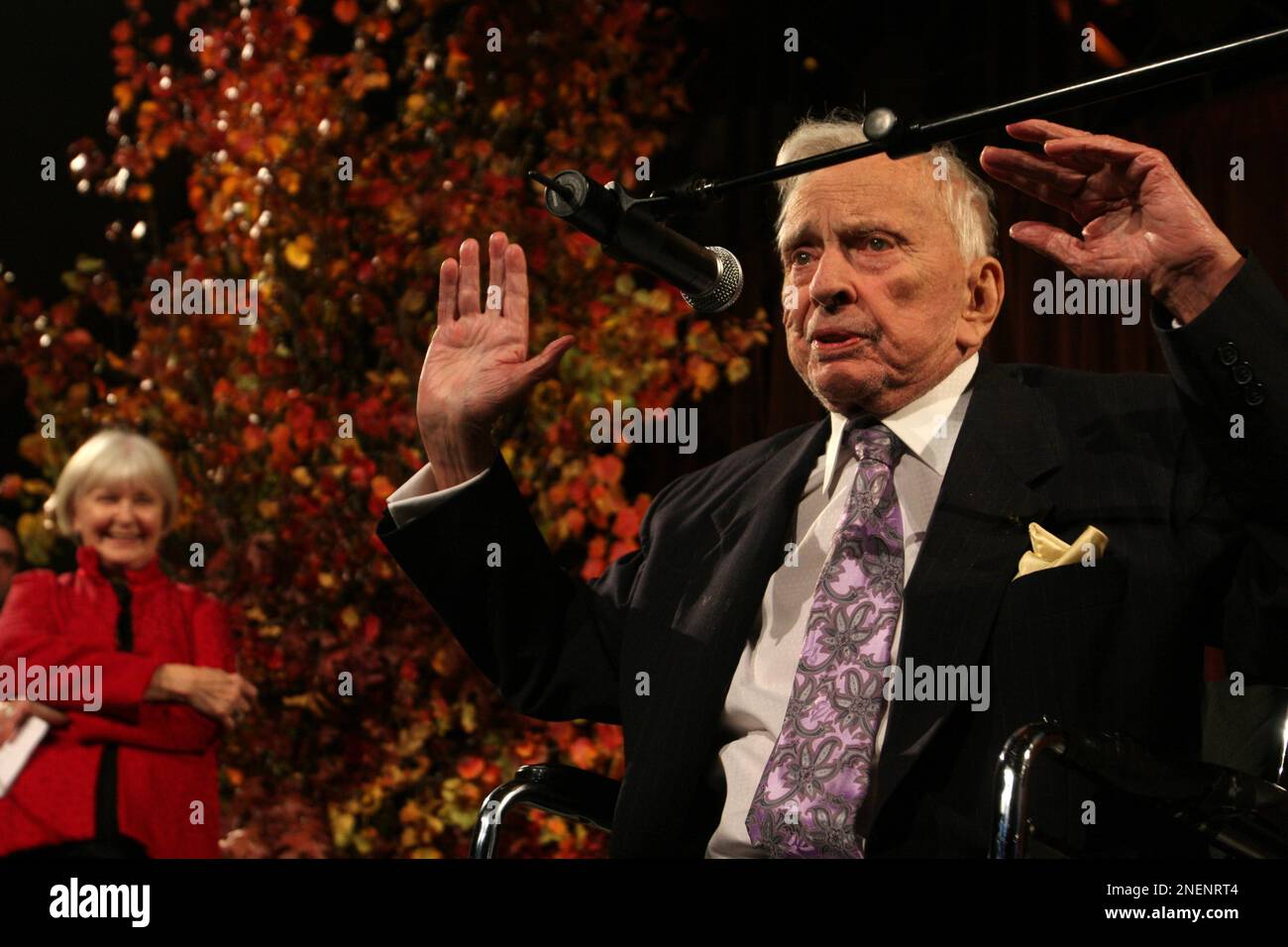 Actress Joanne Woodward, left, stands by as Gore Vidal speaks at the ...