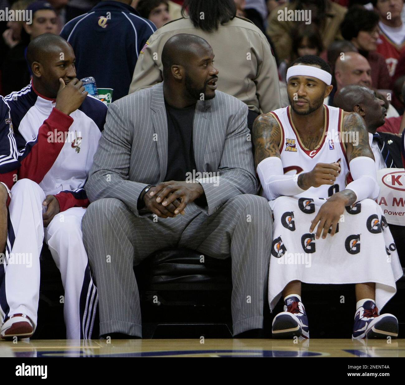 Cleveland Cavaliers' Shaquille O'Neal, center, watches from the bench ...