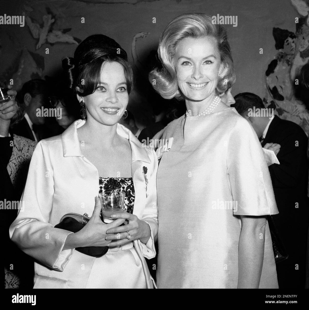 Actresses Dina Merrill, right, and Leslie Caron, pose together on ...