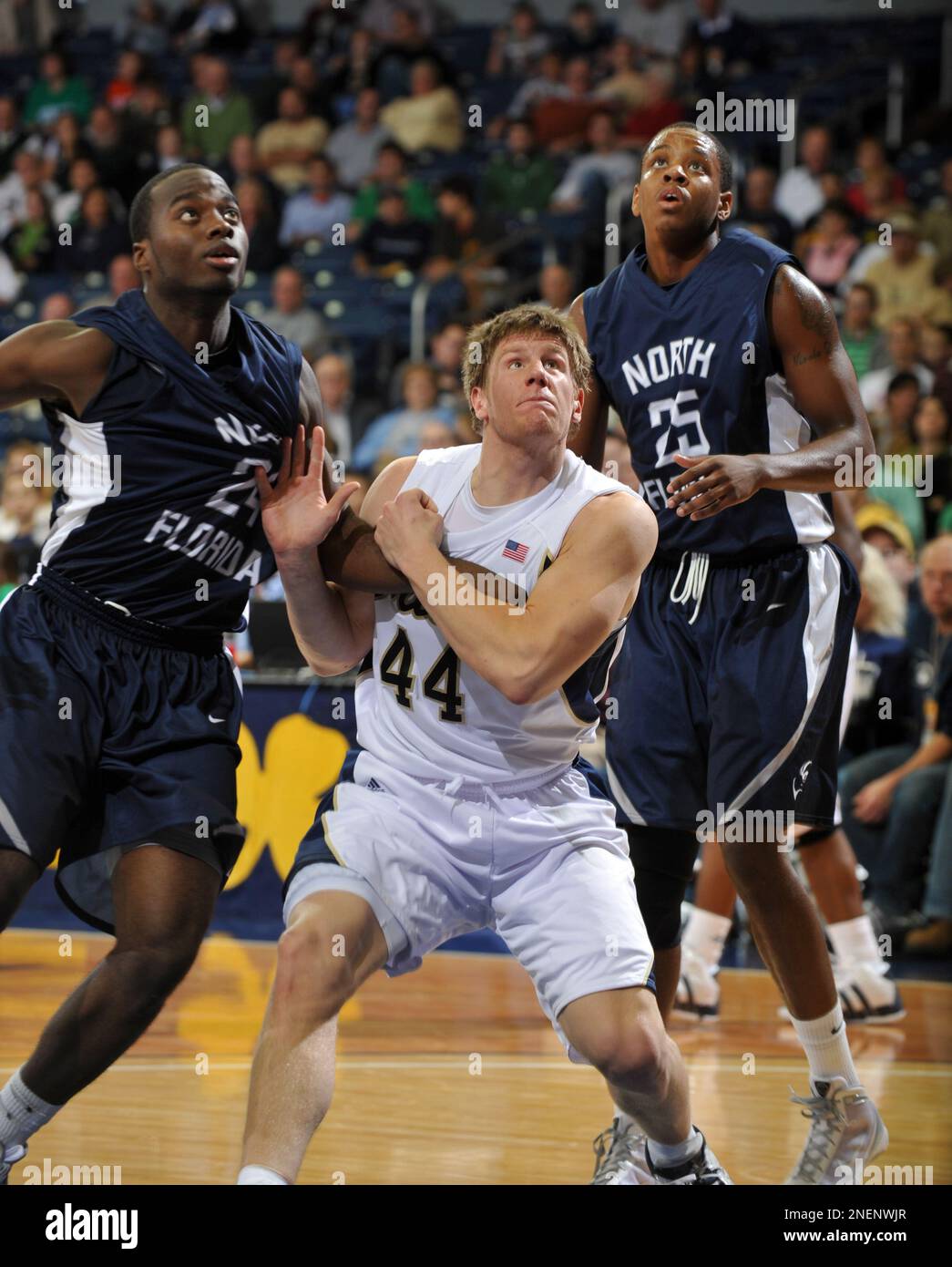Notre Dame forward Luke Harangody battles for position for a rebound ...