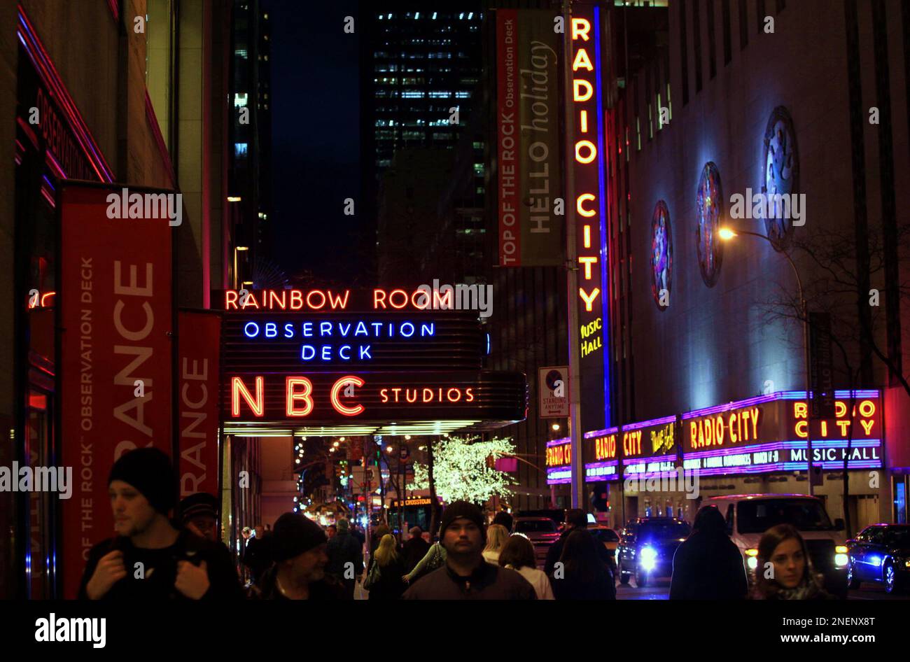 The NBC logo glows in neon lights among other iconic signage at its ...