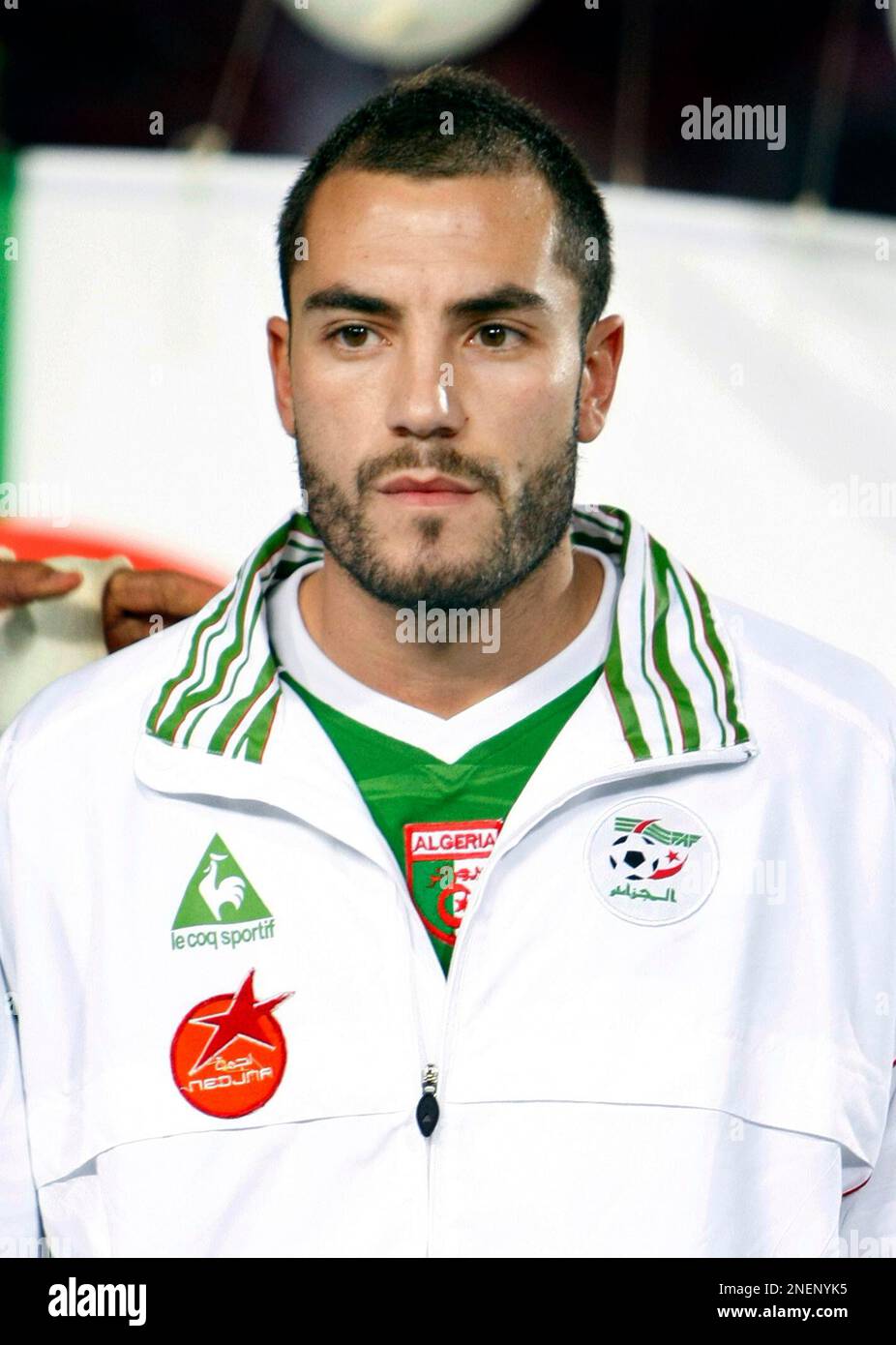 Algeria's Morad Mogni listens to the national anthem ahead of their ...