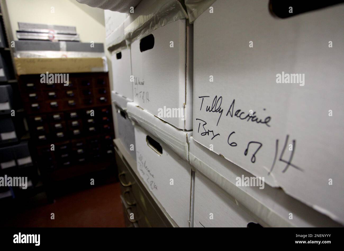 Sealed boxes, right and top left, containing the archives of Grace ...