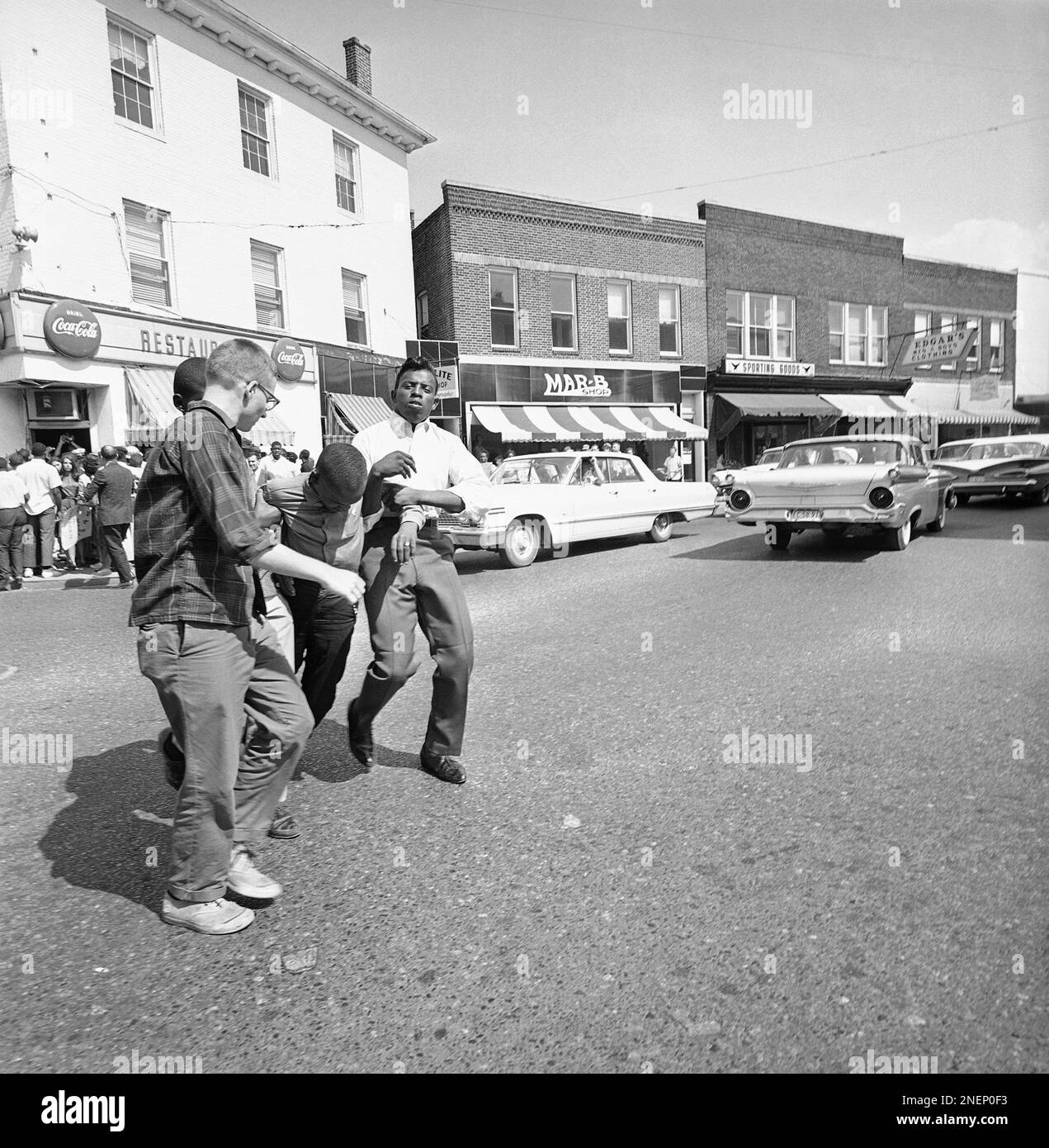 A demonstrator, one of about eight who entered a segregated restaurant ...