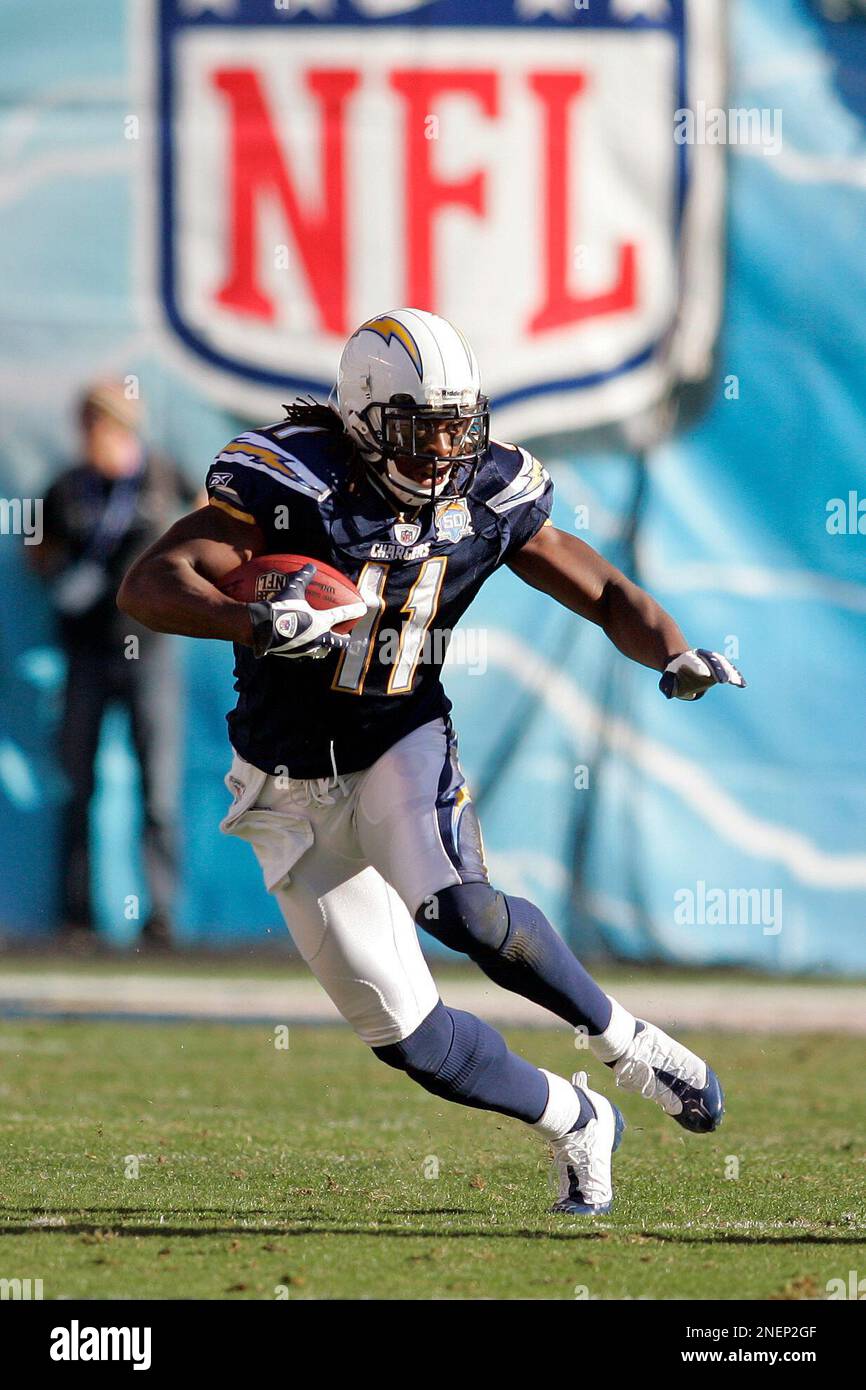 San Diego Chargers wide receiver Legedu Naanee runs for yardage during ...
