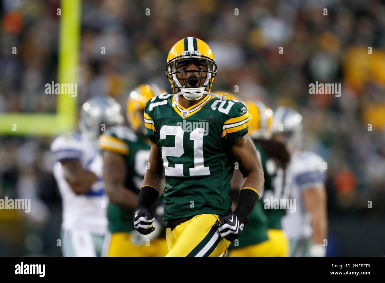Green Bay Packers' Charles Woodson reacts during the first half of an ...