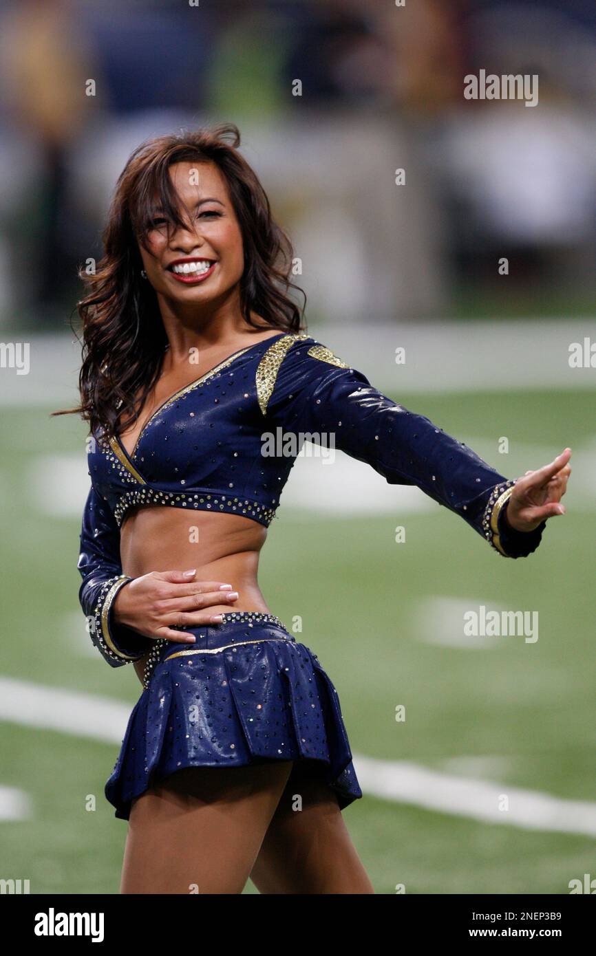 A St. Louis Rams cheerleader performs during the third quarter of an ...